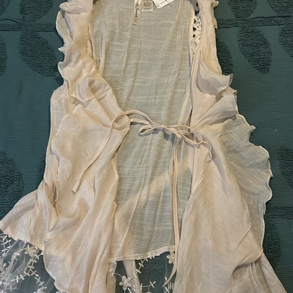 Simply Irresistible | Tops | Sleeveless Open Front Ruffles With Lace ...